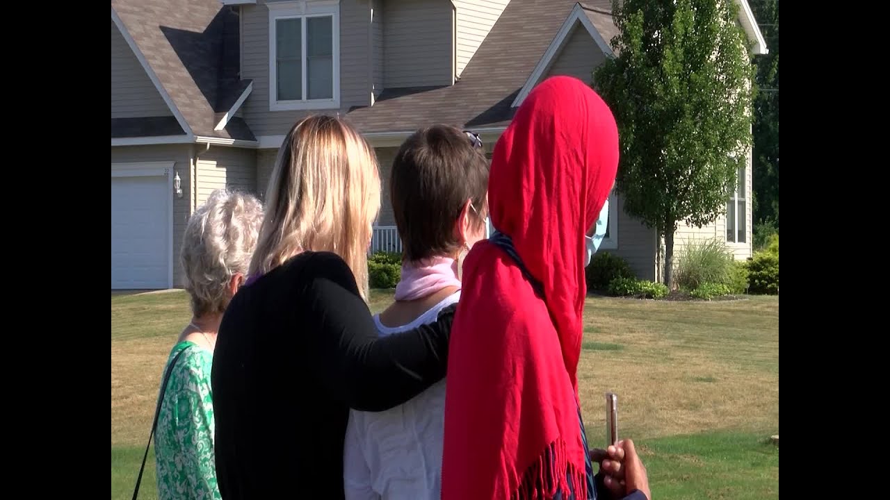 Protesters gathered at Sheriff Baxter's home Sunday, demanding answers ...