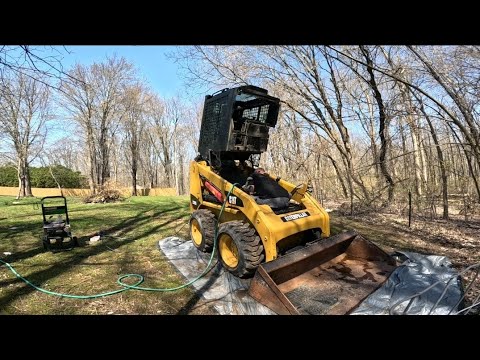 Lifting The Cab And Power Washing My Skid Steers Belly Pan - YouTube