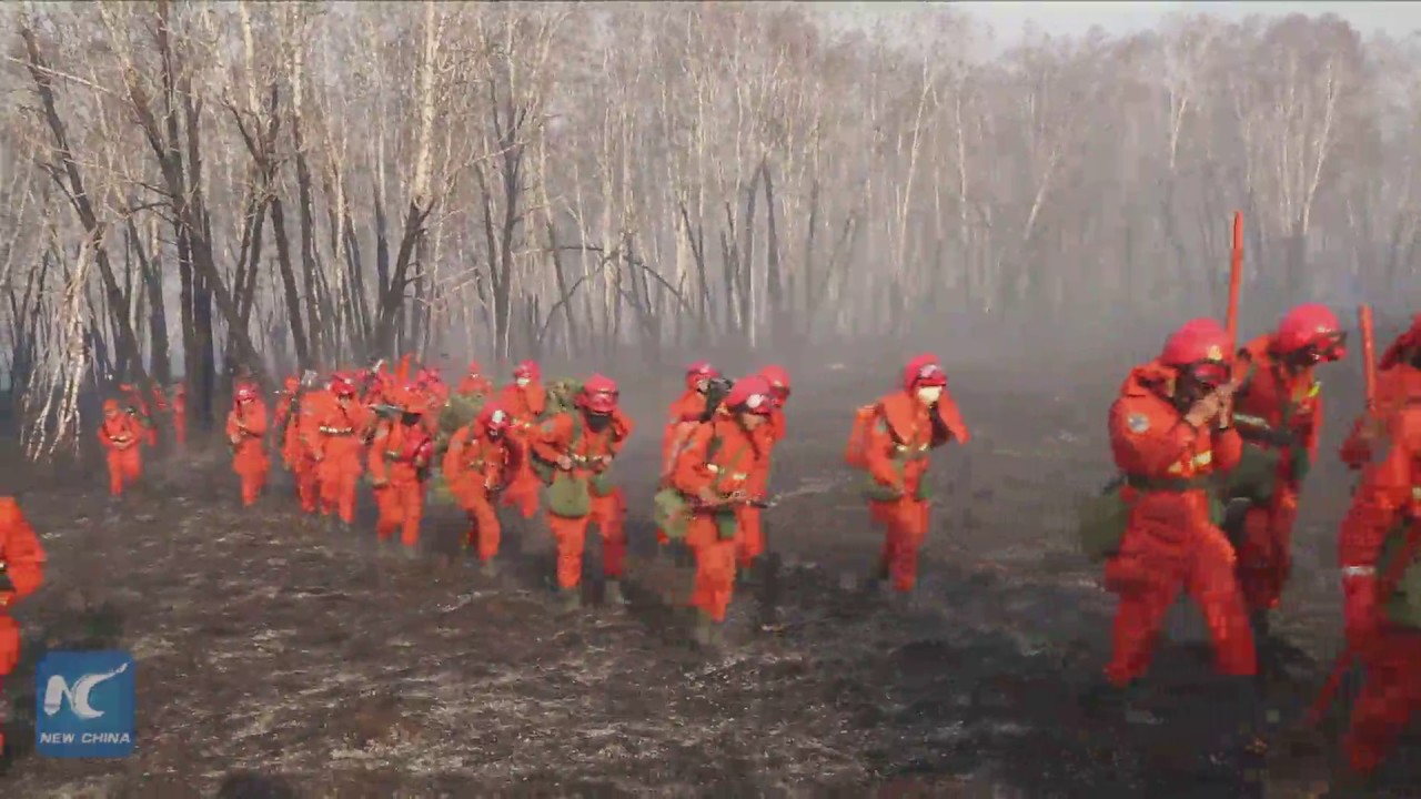 Watch how fire fighters tackle a blazing inferno in north China - YouTube