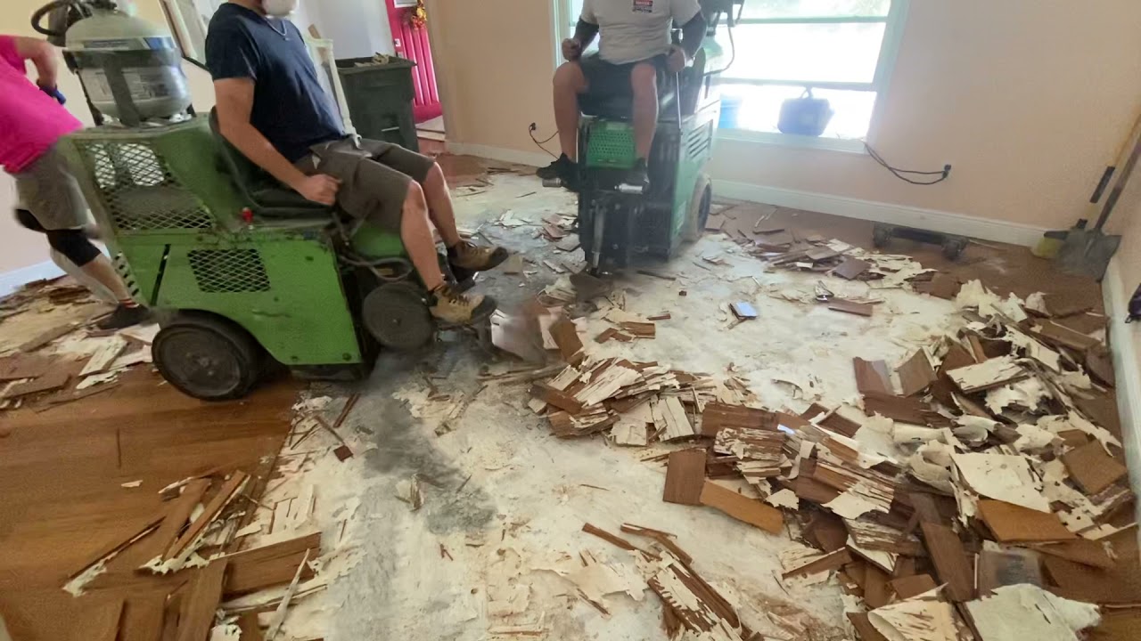 2 National flooring scrapers ripping up Bamboo wood flooring. - YouTube