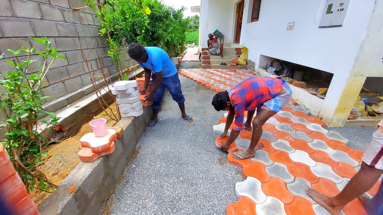Wow gigantic! Cosmic Design Paver block installation for House front ...