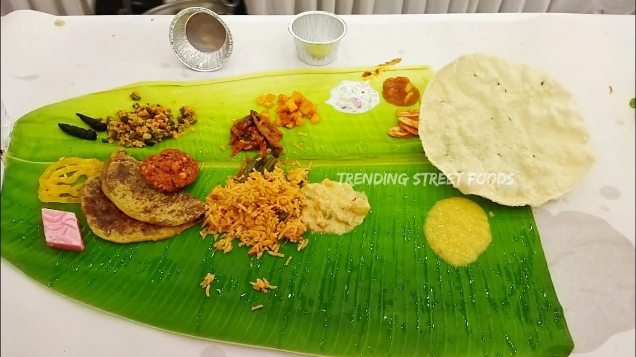 Delicious Tamil Wedding Lunch is Served in Banana Leaf - YouTube