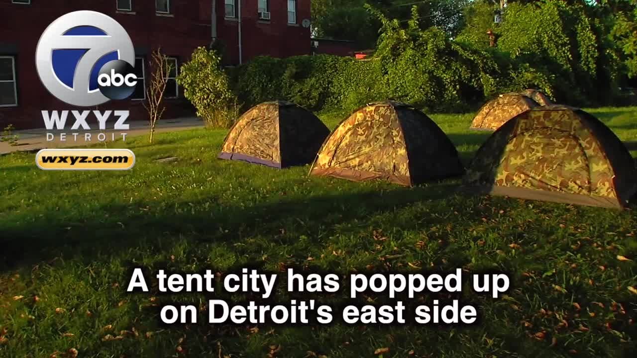 Group erects tent city for Detroit homeless on city's east side - YouTube
