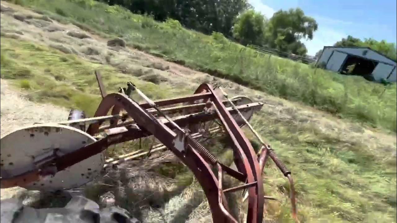 Raking First Cutting Hay - YouTube