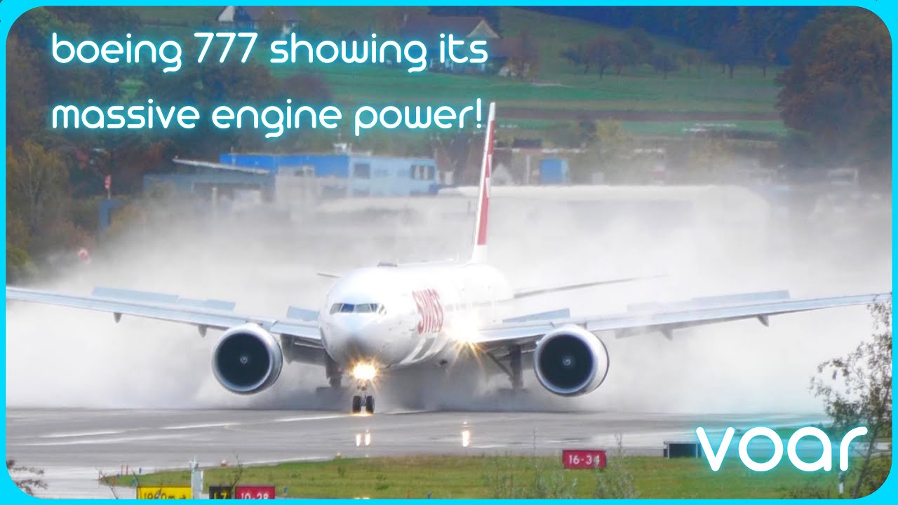 SWISS Boeing 777 showing reverse thrust power on wet runway at Zurich ...