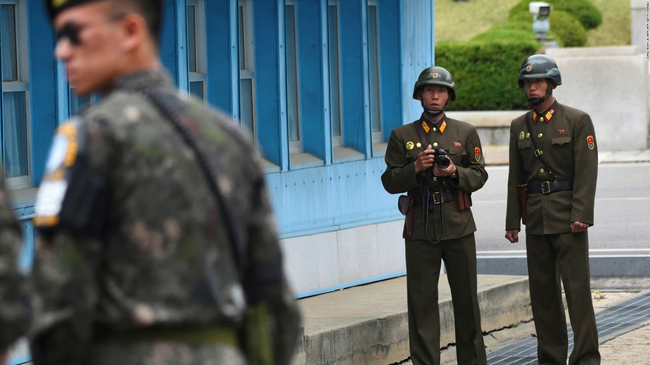 North Korean soldier is shot while defecting across DMZ. - YouTube