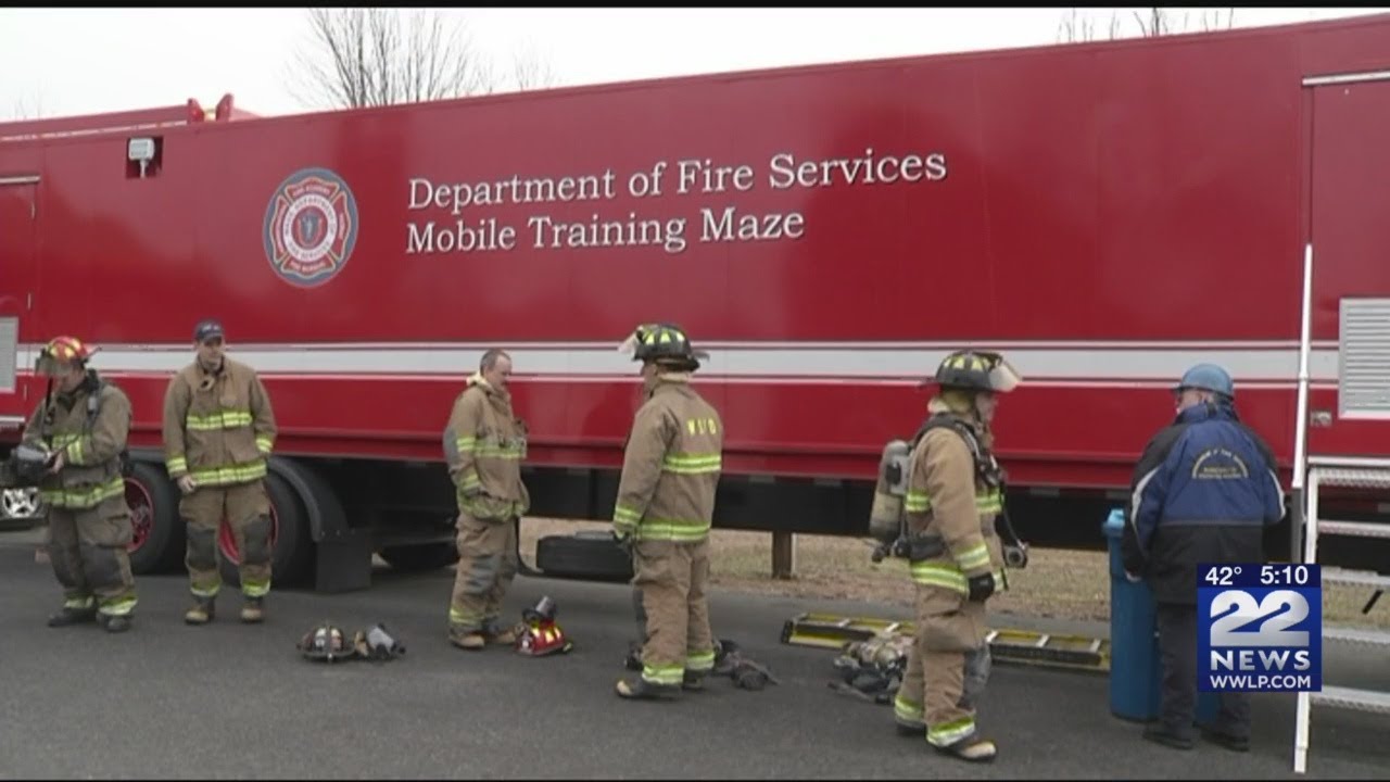 Firefighters train using a maze trailer - YouTube