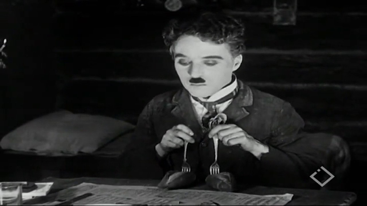 Charlie Chaplin Dance of the rolls HD - YouTube