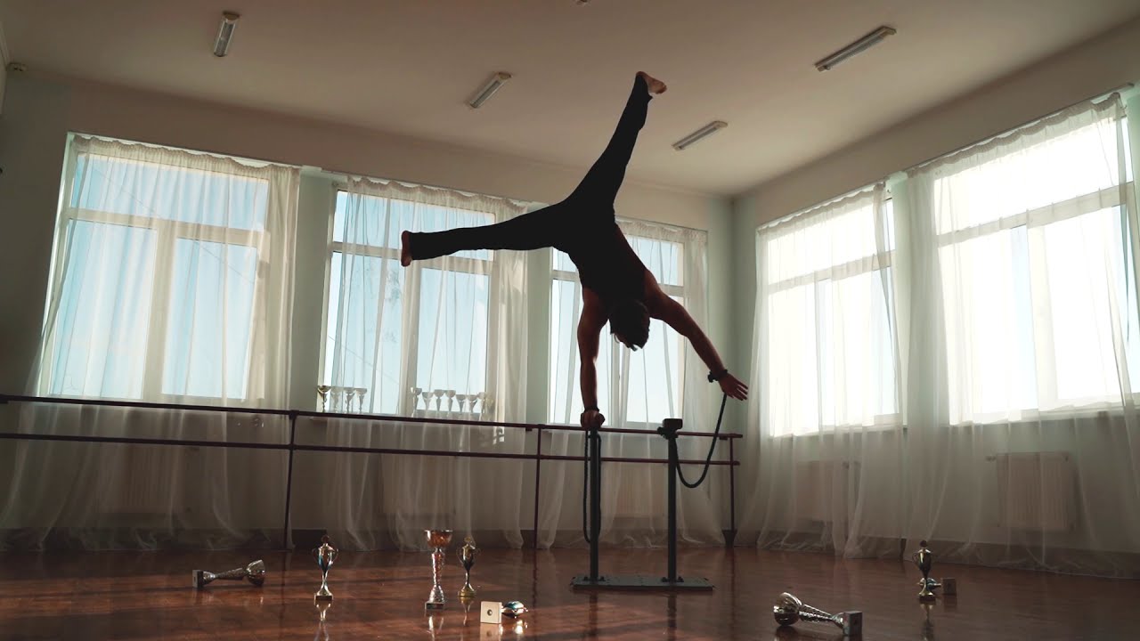 Hand balancing act by Tsudikov Kirill - YouTube