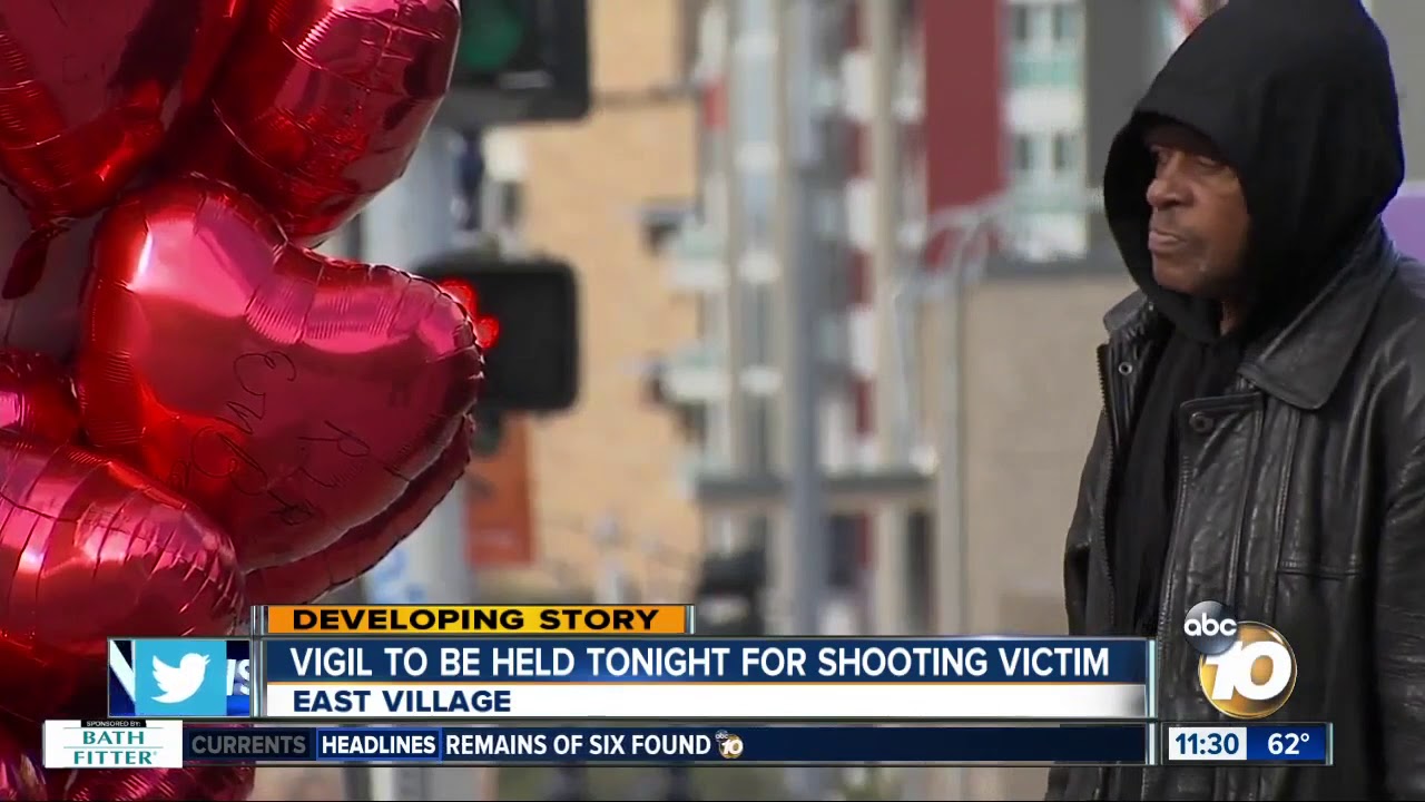 Vigil being held in honor of slain security guard - YouTube