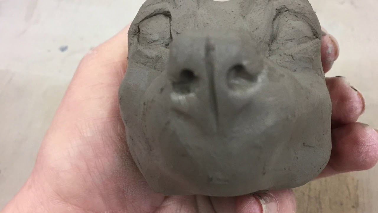 How to model a dogs head from clay - YouTube