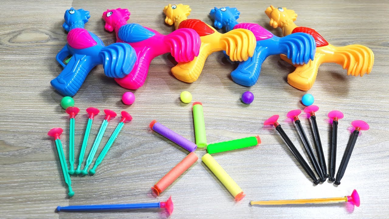 Colored Toy Guns with Nursery Rhymes Box of Toy Guns with color ...