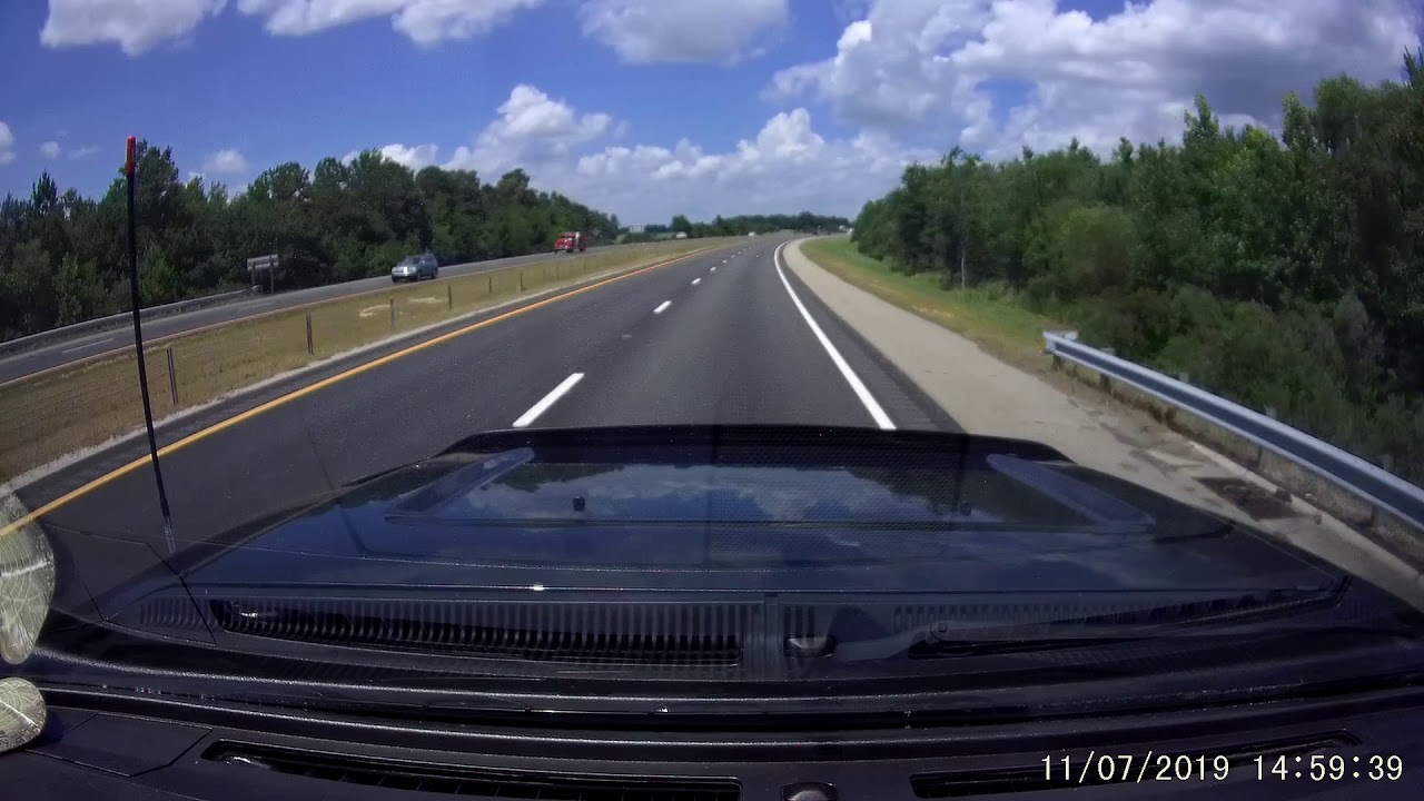 FIRE TRUCK LOSES HOSE GOING 70 MPH DOWN HIGHWAY - YouTube