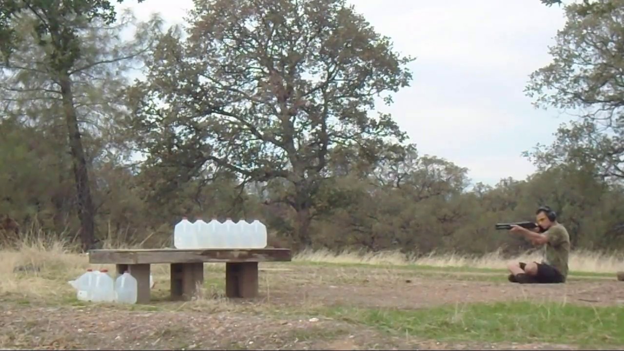 12 Gauge #2 shot 3 inch wax slug water jug test - YouTube
