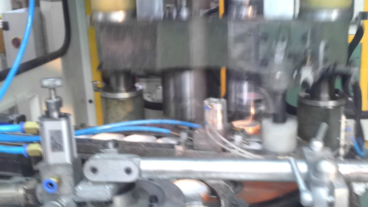 Lug cap production line (semi automatic feeder) - YouTube