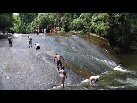 Sliding/sufing down the Tarzan waterfall