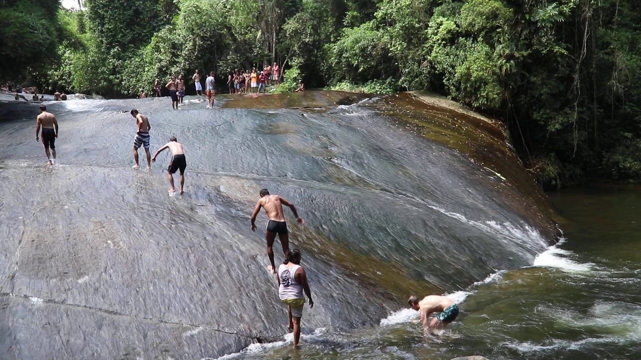 Sliding/sufing down the Tarzan waterfall - YouTube