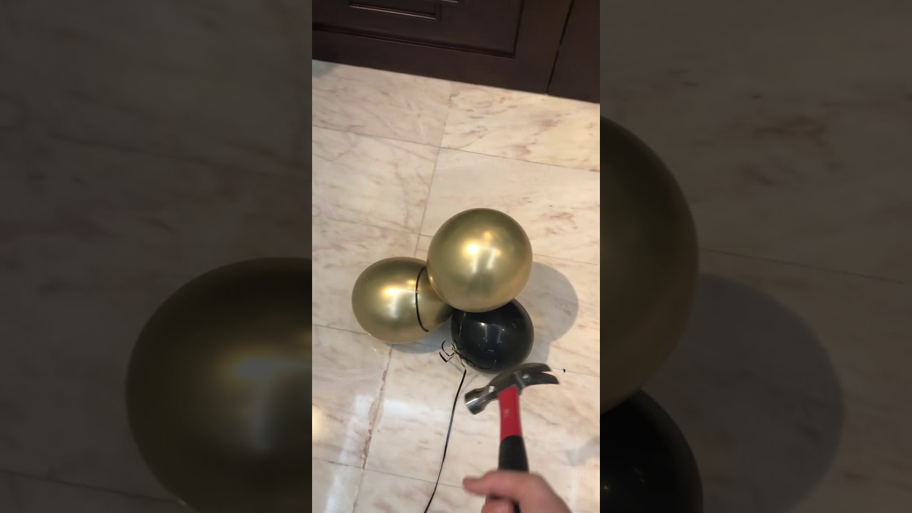 Hammer smashes balloons (brutal) - YouTube