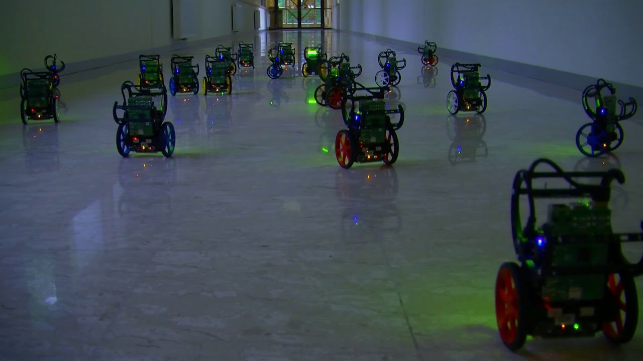 Firefly synchronization of a robot swarm - YouTube