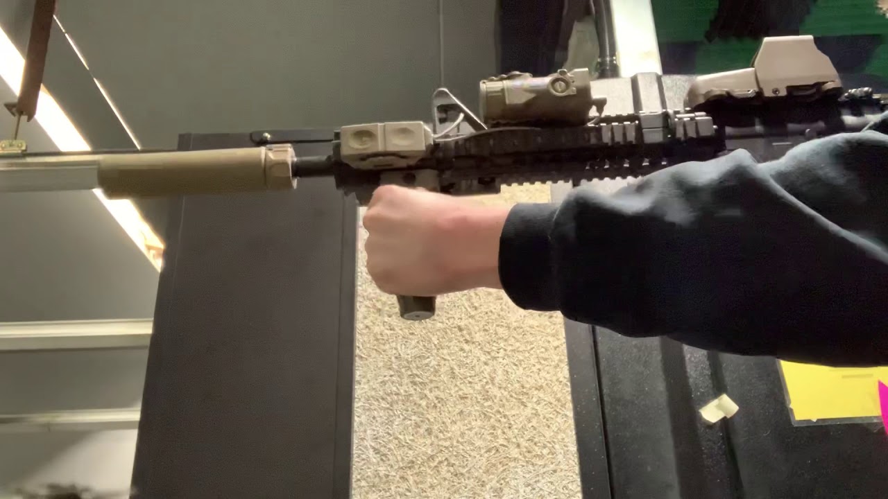 Colt Block II FSP w/ SureFire 212 suppressor - YouTube