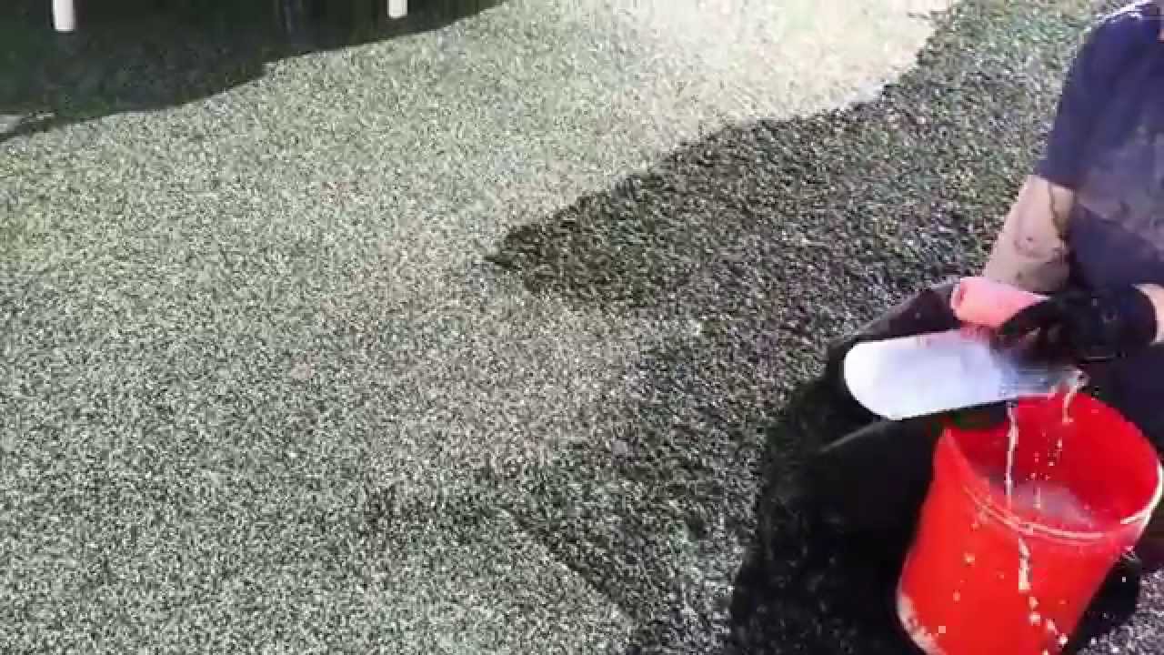 EPDM Wear Layer install in poured in place rubber system - YouTube