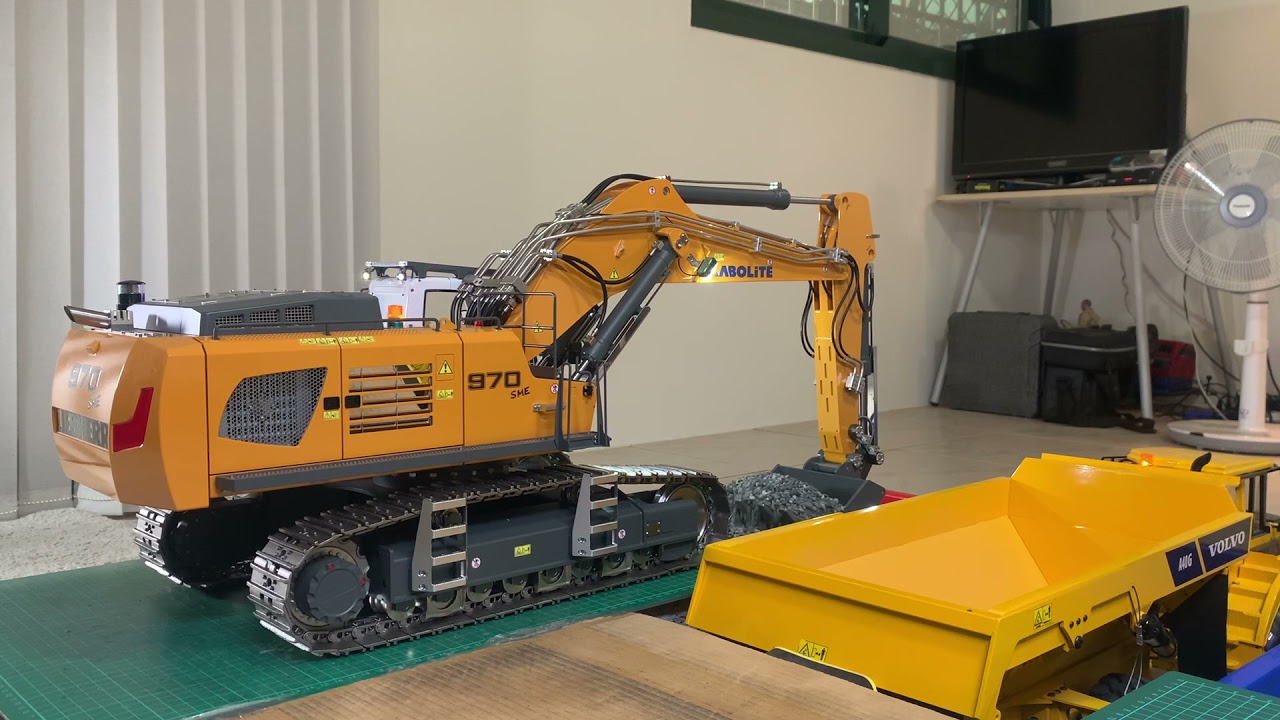 RC 1/14 KABOLITE 970 excavator _VOLVO A40G Dump Truck - YouTube