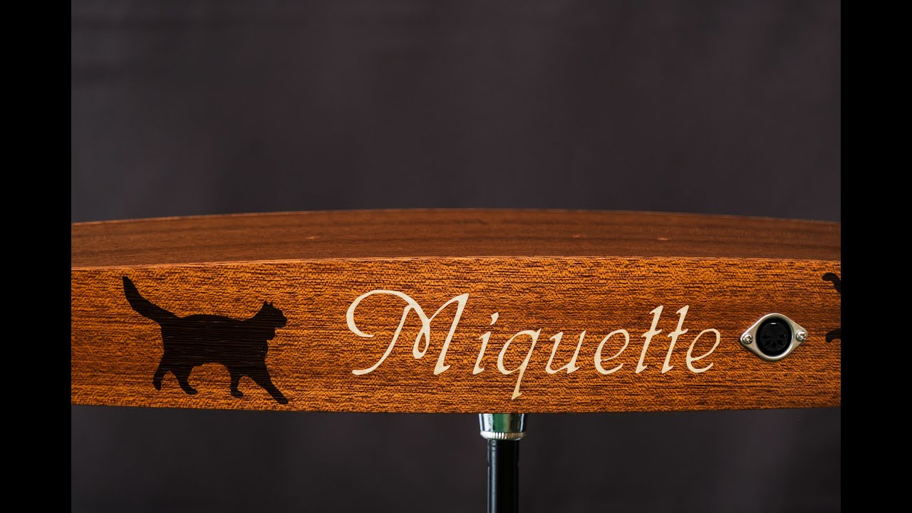 Inlay work made with a scroll saw. 猫の図柄をテルミンに埋め込む木工加工 - YouTube