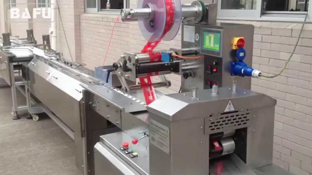 FWC350 aligner feeder flowpack machine - YouTube