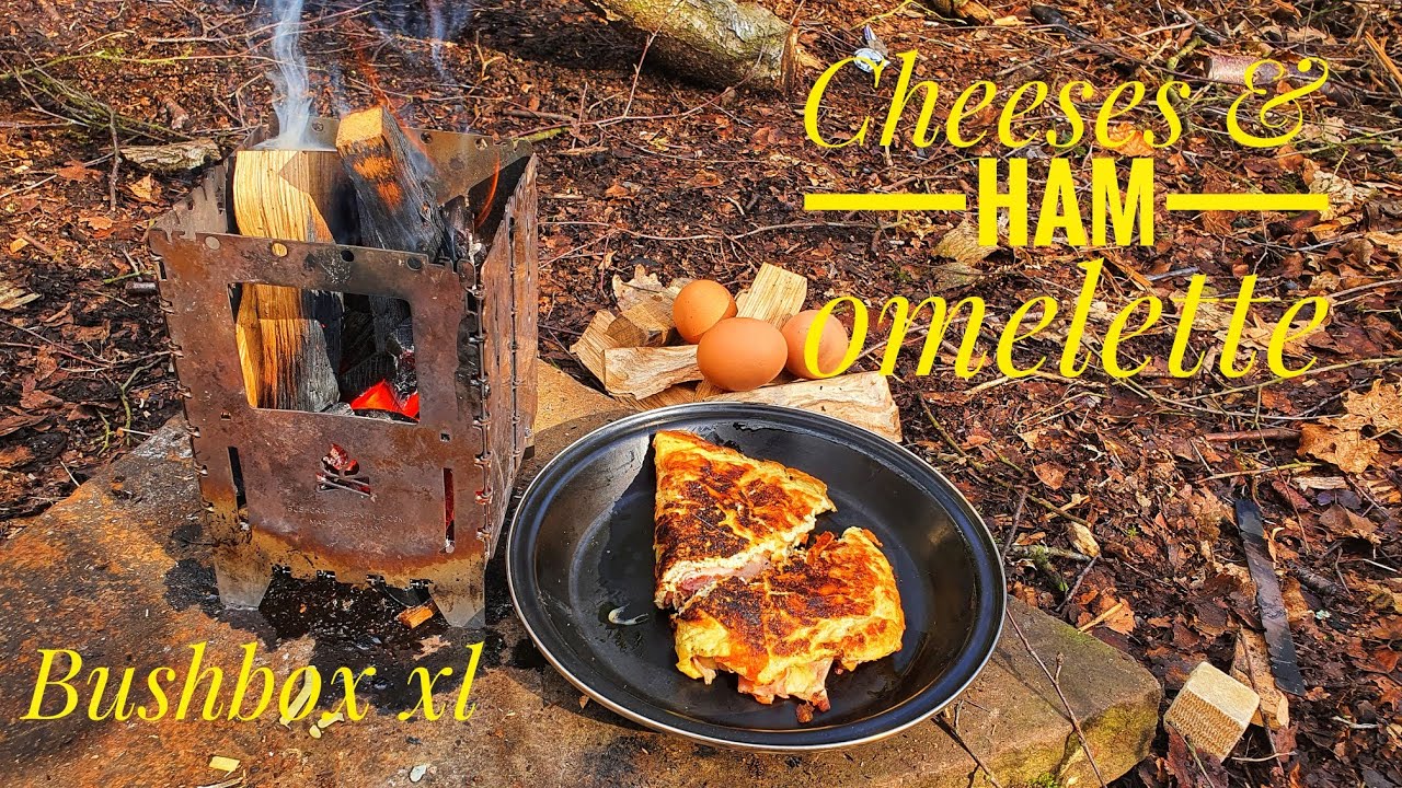 Bushcraft cooking a cheese and ham omelette on my bushbox xl stove ...