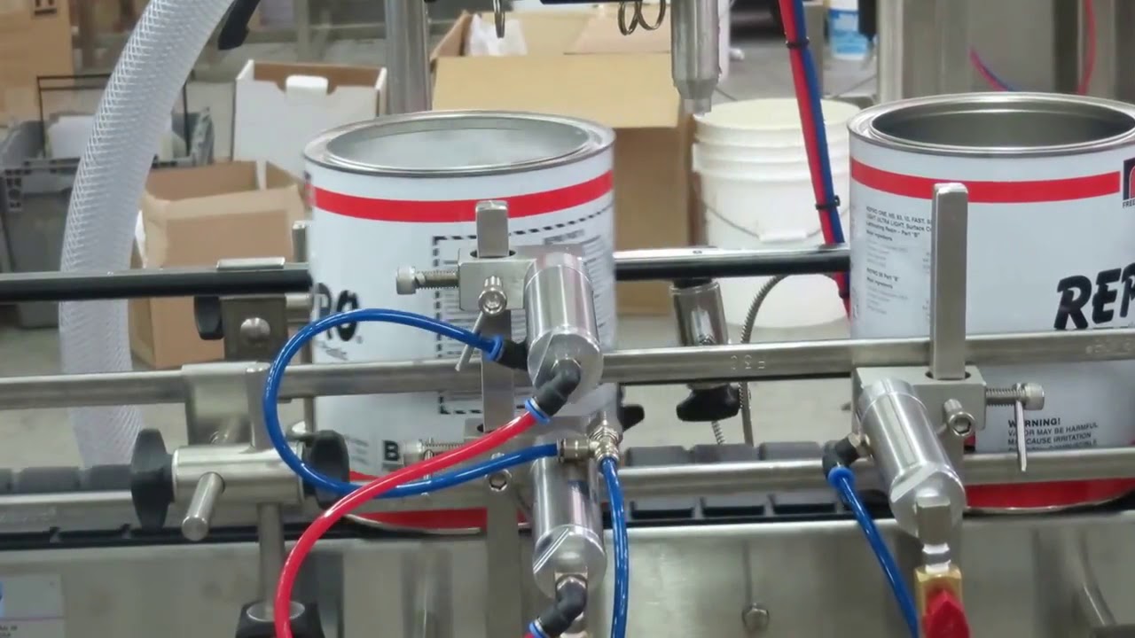 Oden packaging line for friction top paint cans - YouTube