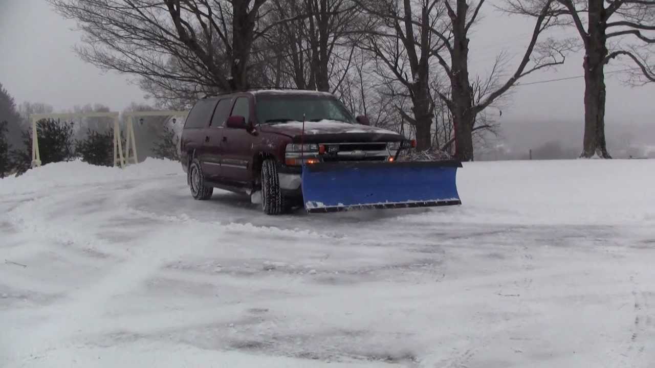 Chevy suburban in snow walk around/with/plow on ice in 4x4 - YouTube