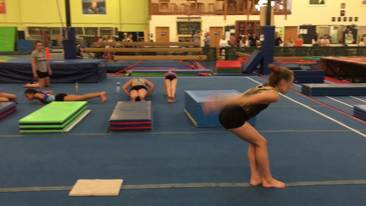 Back handspring layout step out on floor - YouTube