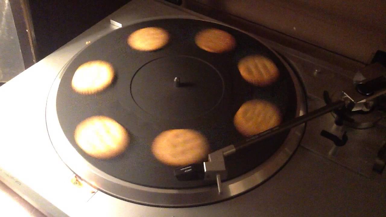 What happens when you spin crackers on record player. - YouTube