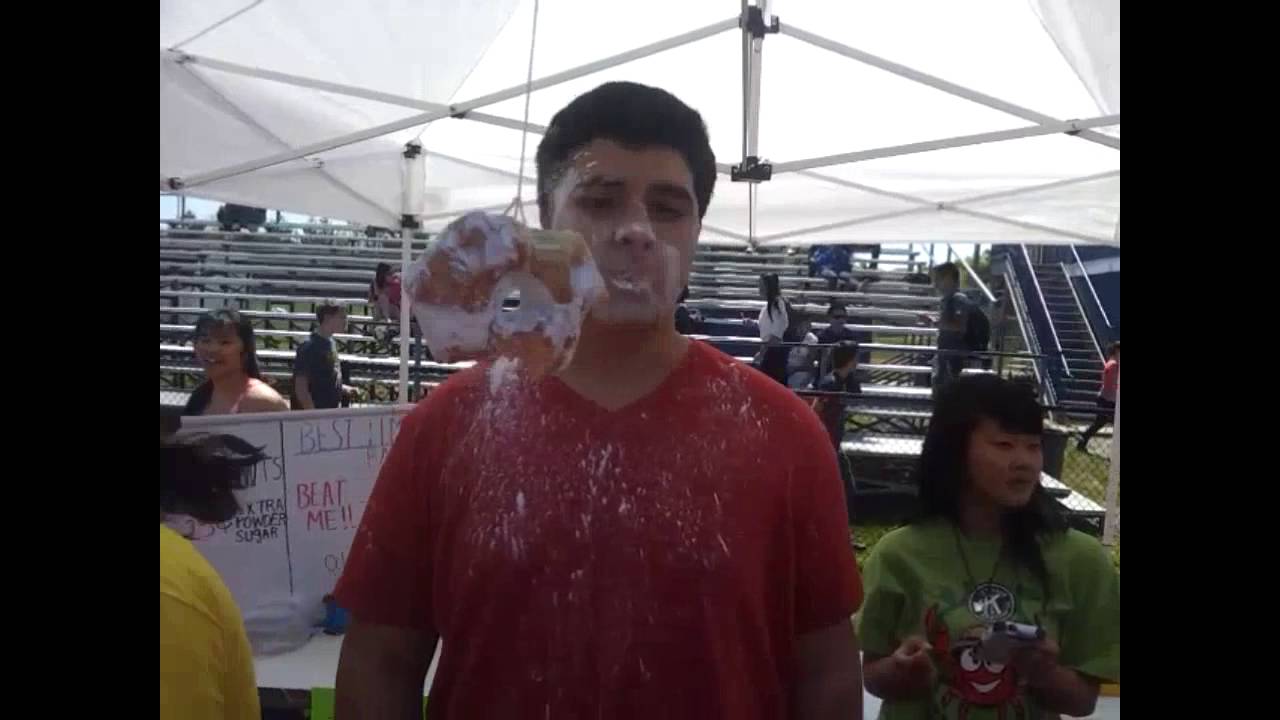 HANGING DONUT EATING CONTEST - YouTube