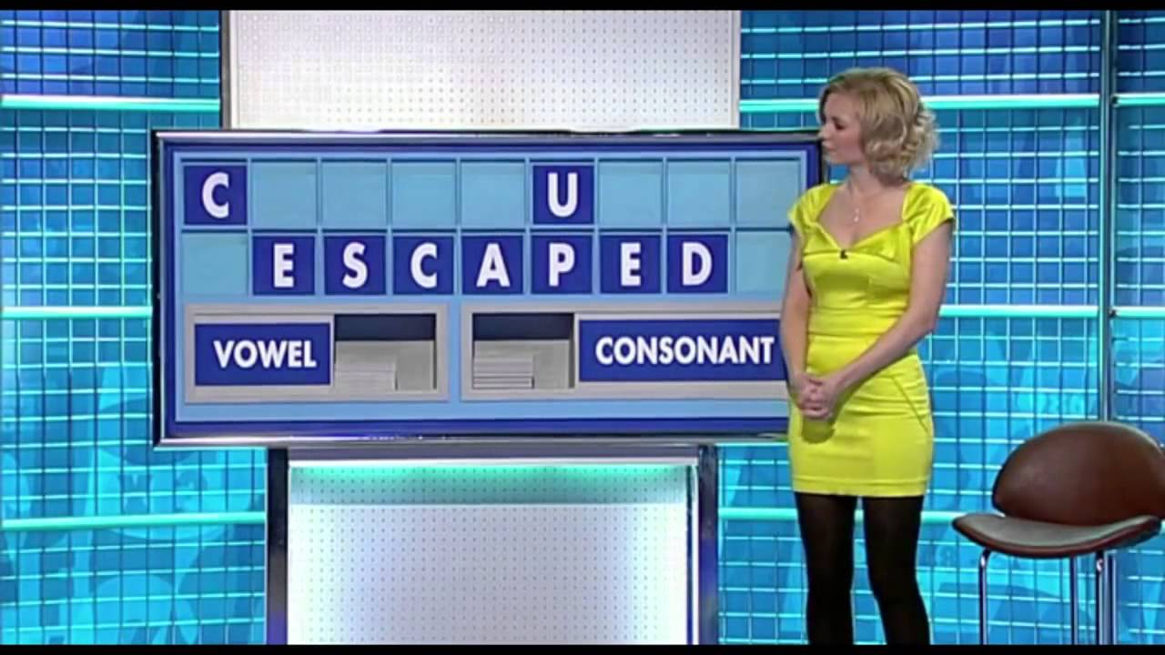 Rachel Riley Satin Yellow Dress Black TIghts Heels tvStars - YouTube