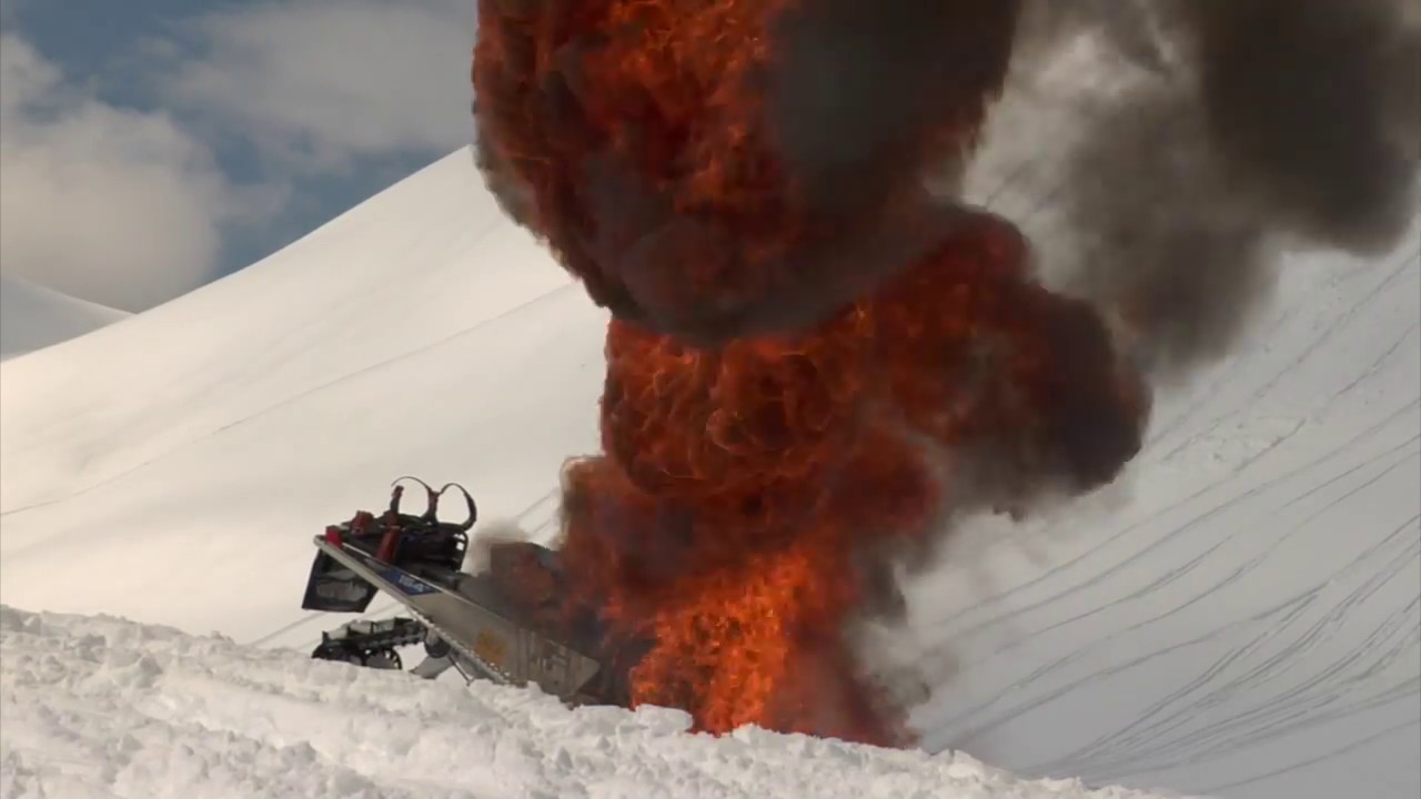 Snowmobile catches fire and explodes - YouTube