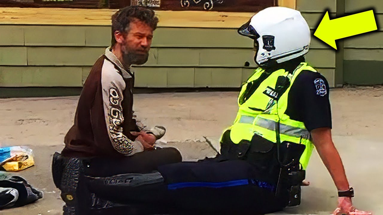 Police officer unaware he was being filmed approaches homeless man ...