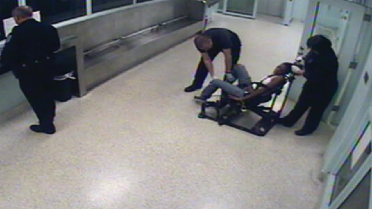 Cut on Camera: Cop cuts off woman's weave - YouTube