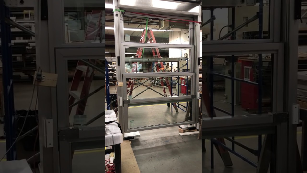 Roll-A-Cover's Vertical Retractable Wall System - YouTube