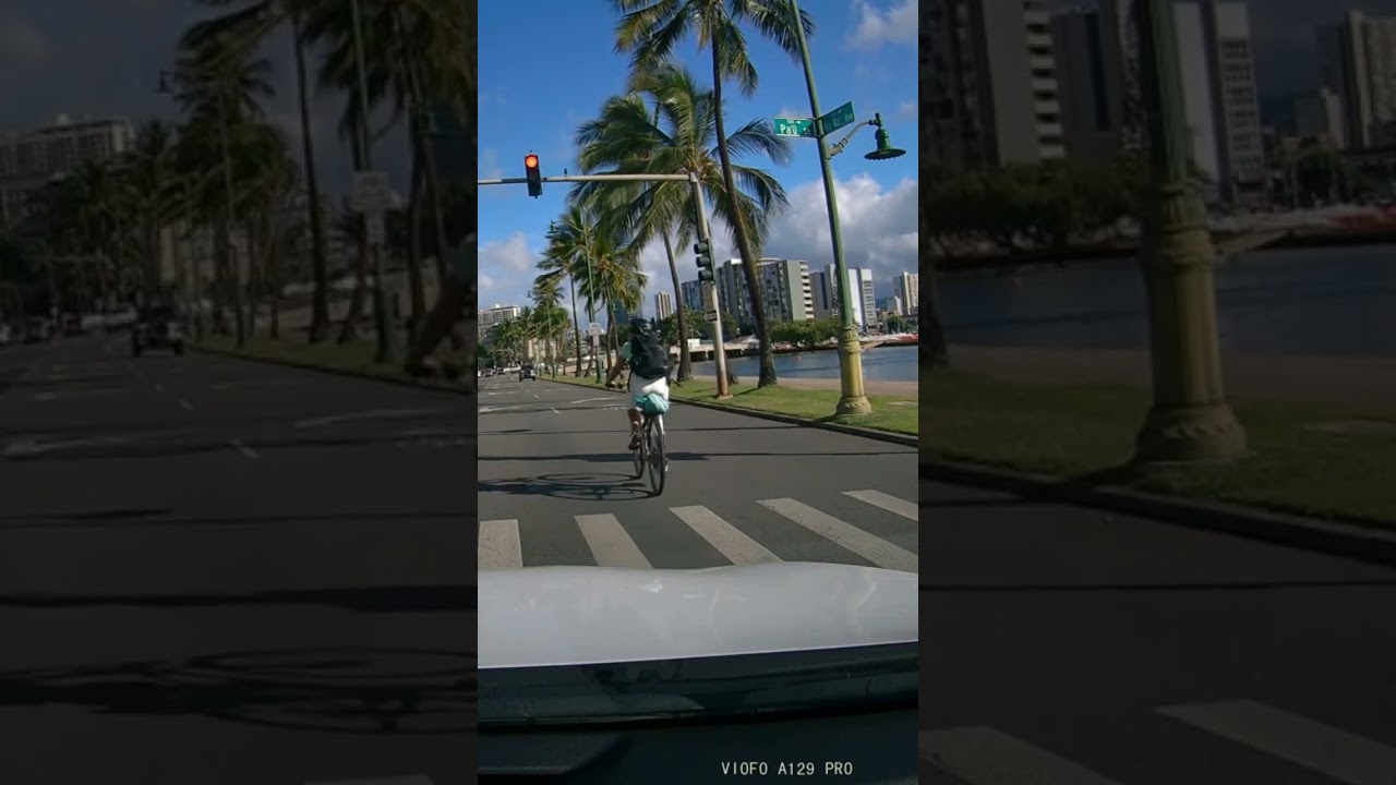 Bicyclist Runs Red Light - YouTube