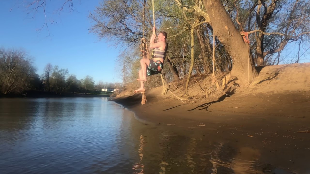 Slow-mo rope swing into freezing cold water - YouTube