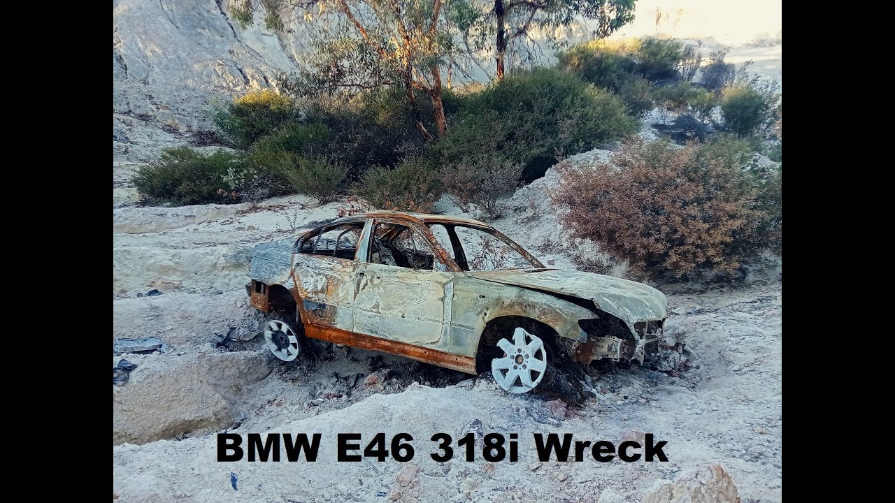 A Wreck BMW E46 318i at the bottom of a cliff (plus a wreck Corolla and ...