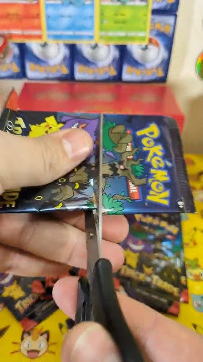 Cutting ️ a pack of pokemon cards, trick or trade. #halloween # ...