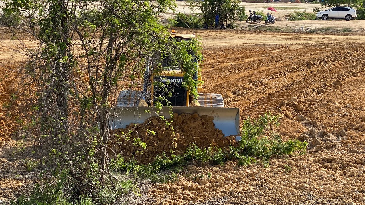 Land filling project activities by Dozer SHANTUI DH17C2 with 30T dump ...