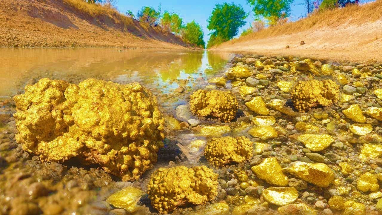 Collection Best Videos Found Mining Gold treasure under mountain stone Young man mining gold ...