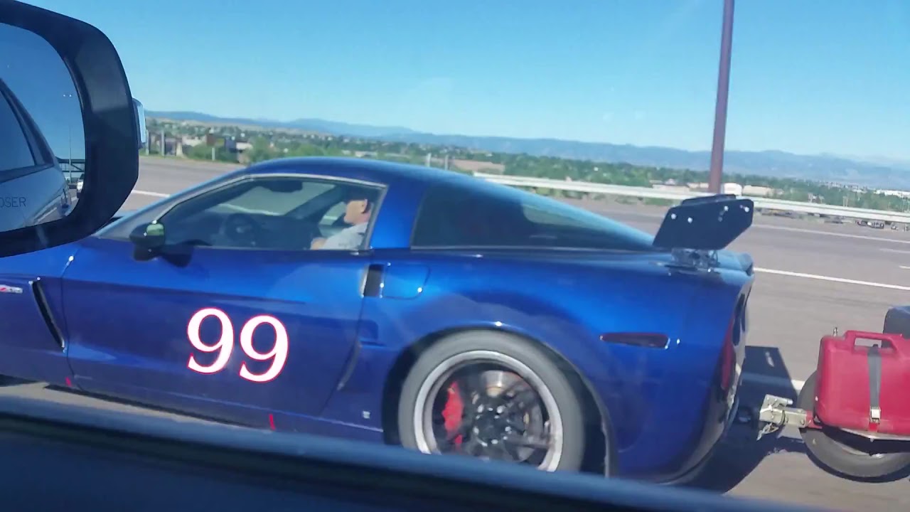 Corvette pulling trailer on I25 - YouTube