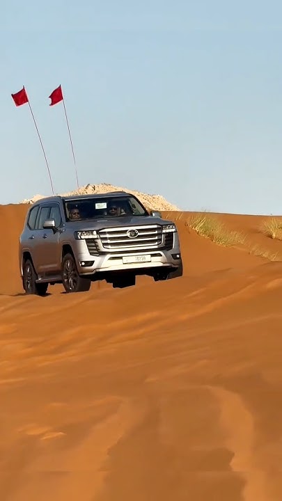 Toyota Land Cruiser LC300 ZX V8 in Dubai dune bashing desert safari. dubai desert pride. desert ...