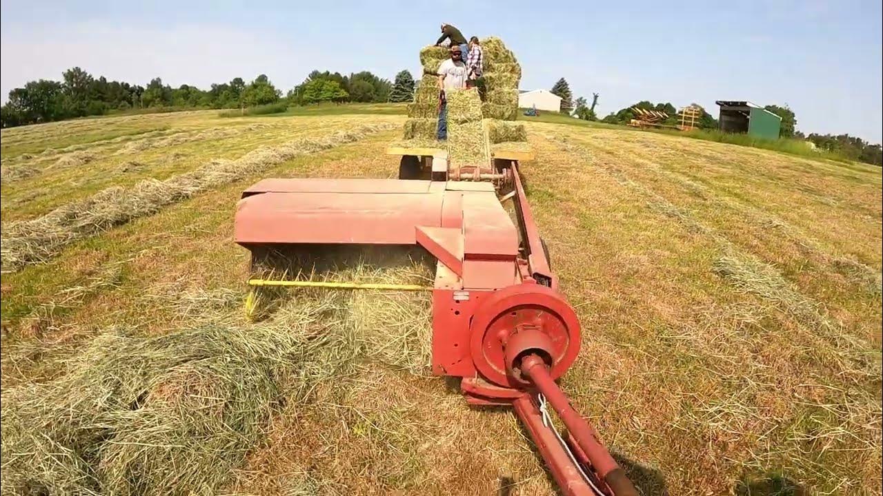 Bailing Heavy First Cutting Hay - YouTube