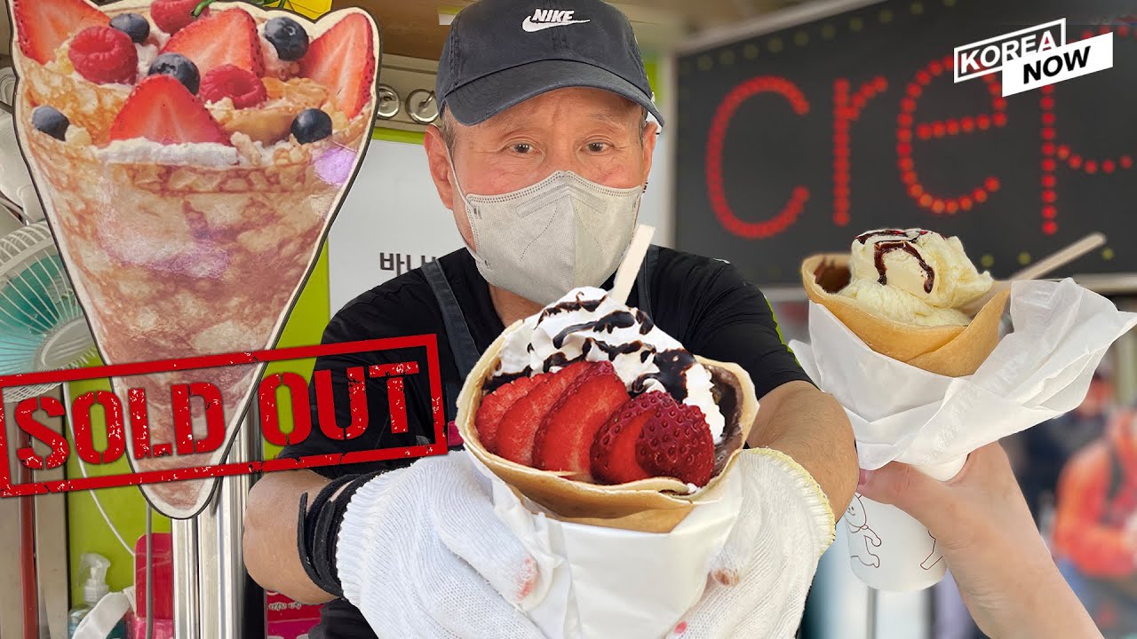 We lined up at the famous crepe place before the opening - YouTube