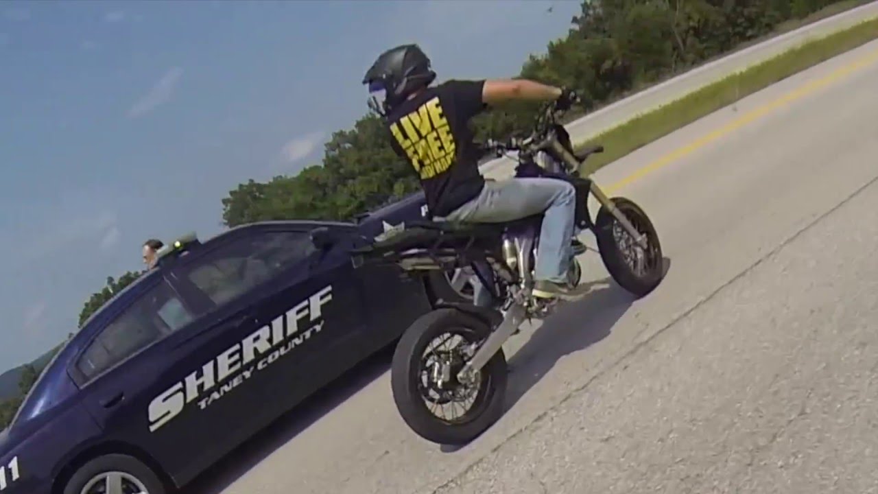 CRAZY STREETBIKER WHEELIES PAST COP, GETS CHASED, THEN CRASHES - YouTube